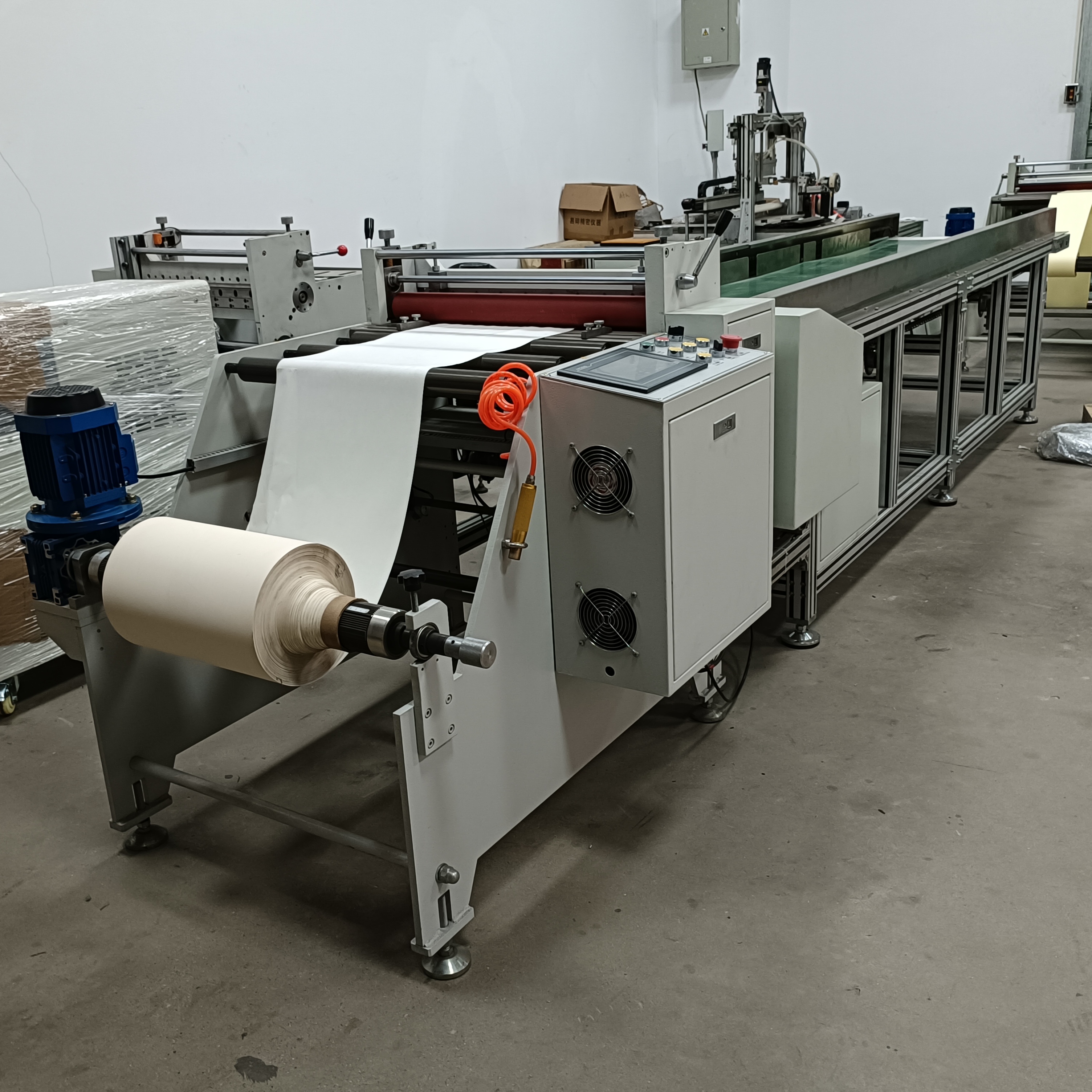 roll to sheet cutting machine